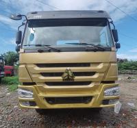 China Gasoline HOWO Tractor Truck with 1000L Fuel Tank and ISO Certified Carbon Steel Cargo Box for sale