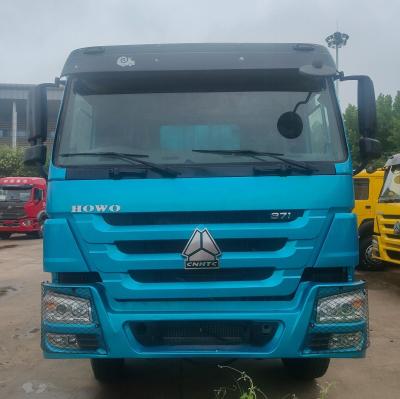 China Transport Solutions Heavy Duty HOWO 8X4 Dump Truck and Fuel Tank 400L Towing Semi Trailer for sale