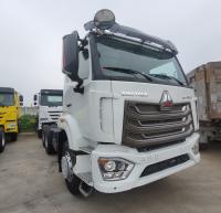 China Sinotruck Trailer Truck with Carbon Steel Cargo Box Material and Air Suspension Seat for sale