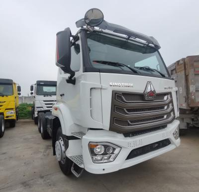 China Sinotruck Trailer Truck with Carbon Steel Cargo Box Material and Air Suspension Seat for sale