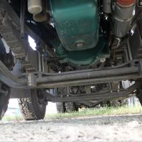 China 8x4 Drive Mode Sinotruk Chassis Cement Mixer with Hydraulic Steering and Power Assistance for sale