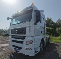 China Towing with Sitrak Heavy Duty Tractor Cargo Transport Truck and Towing Semi Trailer for sale