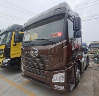 China FAW Jh6 International Gas Tractor with Front Lifting Style Dumping Sinotruk Chassis for sale