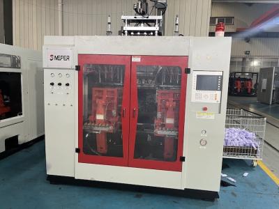 China Three Head Plastic Bottle Blow Molding Machine For 1L Container Capacity Auto Defleshing System Included for sale