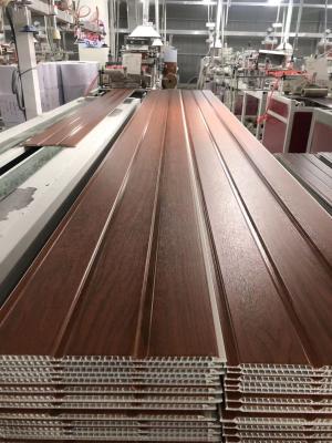 China 25cm PVC Ceiling Panels with Wood Grain Finish - Waterproof, Fire-Resistant in 5-10mm Thickness for sale