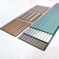 China Wood Grain PVC Wall Panel 5.95m Length 7-9mm Thickness Eco-Friendly Material for Bedroom Living Room TV Background Wall for sale