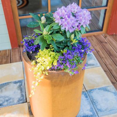 China Luxury Design Large Metal Flower Pots For Home Decor Natural Oxidized for sale