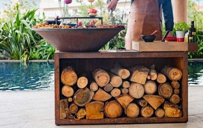 China Outdoor Wood Burning Cone Shaped Corten Steel Rust BBQ Fire Pit Customize for sale