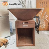 China Corten Steel Outdoor Cooking Grills Fire Pit With BBQ Grill Rust Coating Eat Outside for sale