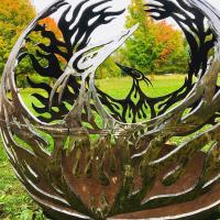 China Phoenix Pattern Steel Fire Pit Outdoor Patio Corten Sphere Firepit For Garden Warming for sale