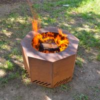 China Camping Heater Wood Burning Corten Steel Round Fire Pit In Outdoor Living Space for sale