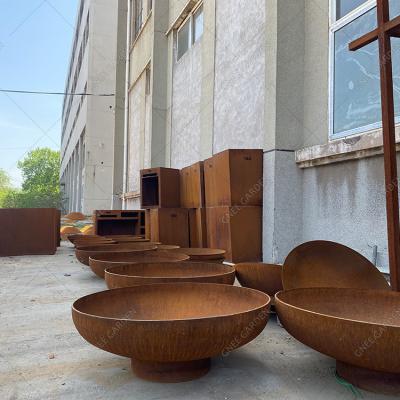 China Corten Steel Garden Outdoor Firepit Modern Fireplace Heating Wood Burning for sale