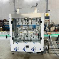 China Automatic Liquid Water Juice Filling Machine Plastic Jar Bottle Multi Head for sale