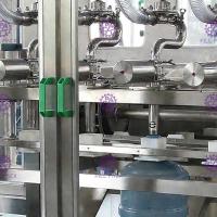 China QGF-600 Mechanical Drive 5-Gallon Water Bottling Machine - 600BPH Capacity with 22KW Motor Power for sale