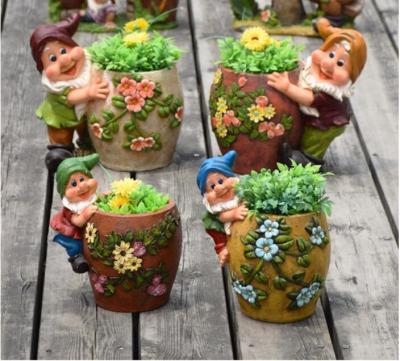 China Resin garden gnome elf figurine flower pot garden decoration for sale