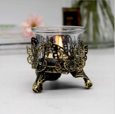 China Antique Brush Gold metal hollow Candle holder with butterfly /rose design and telight cup for sale