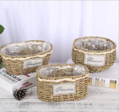 China Creative Grass Woven Flower Pot Basket for sale