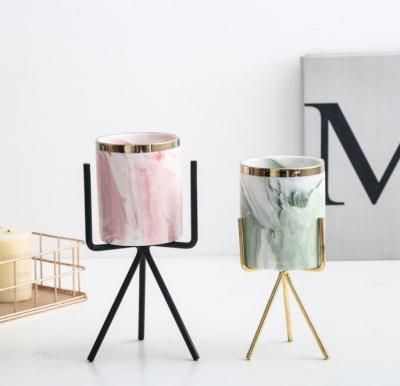 China Nordic Style Creative Home Marble Ceramic Flower Pot with Iron Stand for sale