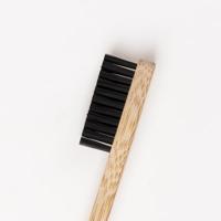 China Round Charcoal Bamboo Handle Toothbrush Stick Spray Paint Silk Screen Logo for sale