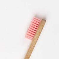 China Round Charcoal Bamboo Handle Toothbrush Stick Spray Paint Silk Screen Logo for sale