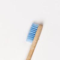 China Round Charcoal Bamboo Handle Toothbrush Stick Spray Paint Silk Screen Logo for sale