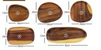China Irregular Oval Wooden Serving Plates Fruit Acacia Wood Serving Tray Customized for sale