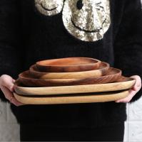 China Irregular Oval Wooden Serving Plates Fruit Acacia Wood Serving Tray Customized for sale