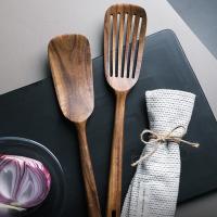China 33.8cm Teak Solid Kitchen Wooden Utensils Heat Resistant Non Stick Pan Spatula for sale