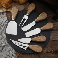 China Stainless Steel Wood Handle Cheese Knives Modern Butter Steak Knife And Fork Set for sale