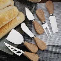 China Stainless Steel Wood Handle Cheese Knives Modern Butter Steak Knife And Fork Set for sale