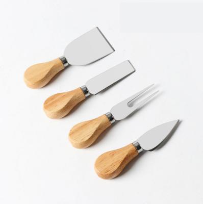 China Oak Handle Pizza Wooden Cheese Knife Set Stainless Steel Four Piece for sale