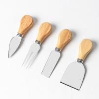 China Oak Handle Pizza Wooden Cheese Knife Set Stainless Steel Four Piece for sale