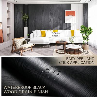 China Black Wood Grain PVC Film Roll 0.15mm 1400mm Waterproof DIY Wall Covering for sale
