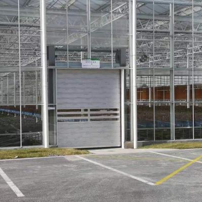China 0.75-1.5KW Anti Wind Spiral High Speed Door For Ambient Food Processing Plants for sale