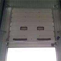 China 4.5W/m.h Heat Preservation Commercial Sectional Overhead Door For Modern Building Solutions for sale