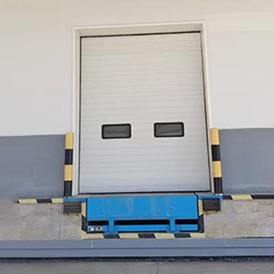 China Custom Colors Industrial Sectional Door Automatic Vertical Lift Overhead Garage Doors For Commercial Retail Facilities for sale