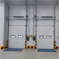 China Custom Vertical Lift Sectional Door Insulated 24dB Overhead Sectional Industrial Doors for sale