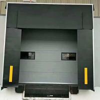 China Vertical Lift Industrial Sectional Doors 0.2m/s-0.4m/s  For Power Generation Facilities for sale