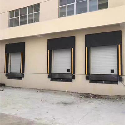 China Vertical Lift Industrial Sectional Doors 0.2m/s-0.4m/s  For Power Generation Facilities for sale
