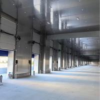 China 40mm-80mm 24dB Insulated Industrial Sectional Overhead Door For Commercial Vehicle Depots for sale