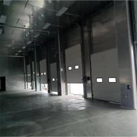 China 40mm-80mm 24dB Insulated Industrial Sectional Overhead Door For Commercial Vehicle Depots for sale