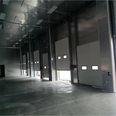 China 40mm-80mm 24dB Insulated Industrial Sectional Overhead Door For Commercial Vehicle Depots for sale