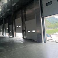 China Steel Sectional Overhead Door 10-15m/min Opening Speed For Airport Ground Support Facilities for sale