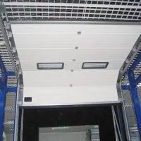 China Vision Panels Sectional Door Easy Large Cargo Handling For Airport Cargo Buildings for sale