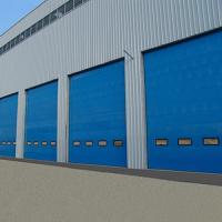 China Compact Sectional Overhead Door 0.2m/s-0.4m/s For Chain Store Central Warehouses for sale