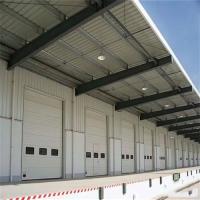 China Noise Reducing Sectional Overhead Door Vertical Lift Garage Door For Logistics Areas for sale