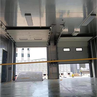 China 0.2-0.4m/s Commercial Sectional Overhead Door For Retail Distribution Warehouses for sale