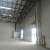 China Motorized Rolling Sectional Overhead Door Industrial Anti Collision Windproof for sale