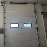 China Heavy-Duty Panel System Industrial Sectional Overhead Door For Production Line Entrances for sale
