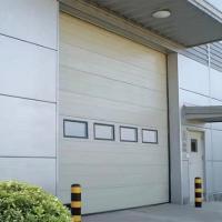 China Smoothly Quietly & Reliably Industrial Sectional Overhead Door For Assembly Workshops for sale